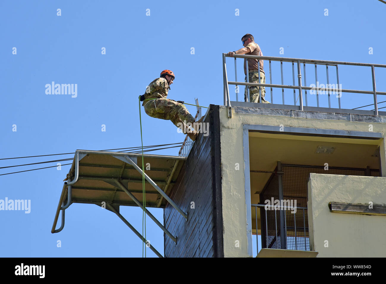 Soldiers from U.S. Army Africa conduct rappel training on the 7th Army ...