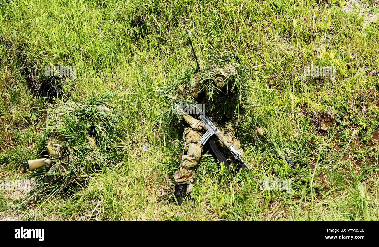 Japanese Ground Self Defense Force snipers holds their position during ...
