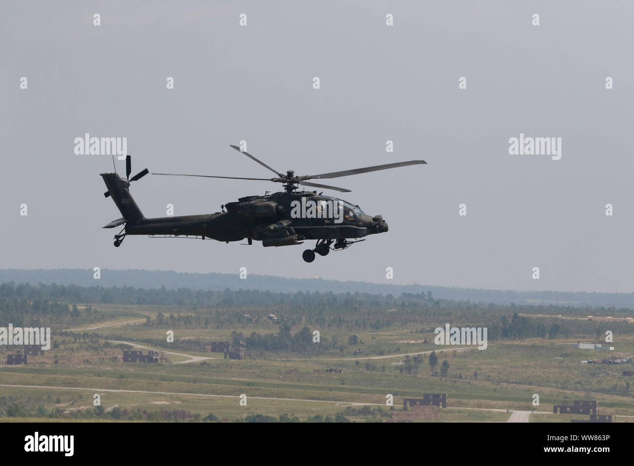 A U.S. Army AH-64D Apache Longbow prepares to fire at a target on a new ...