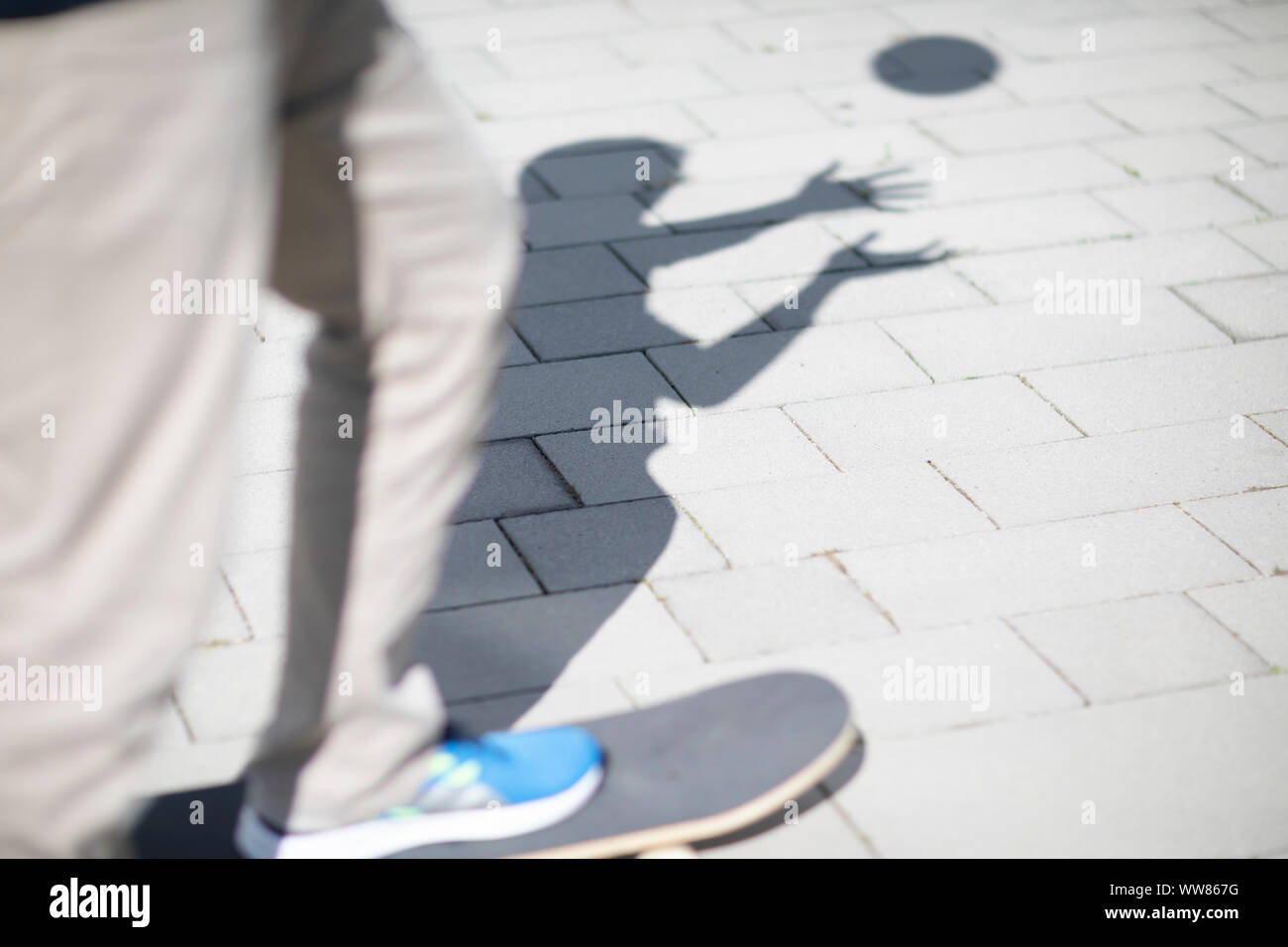 young man skating and playing ball Stock Photo - Alamy