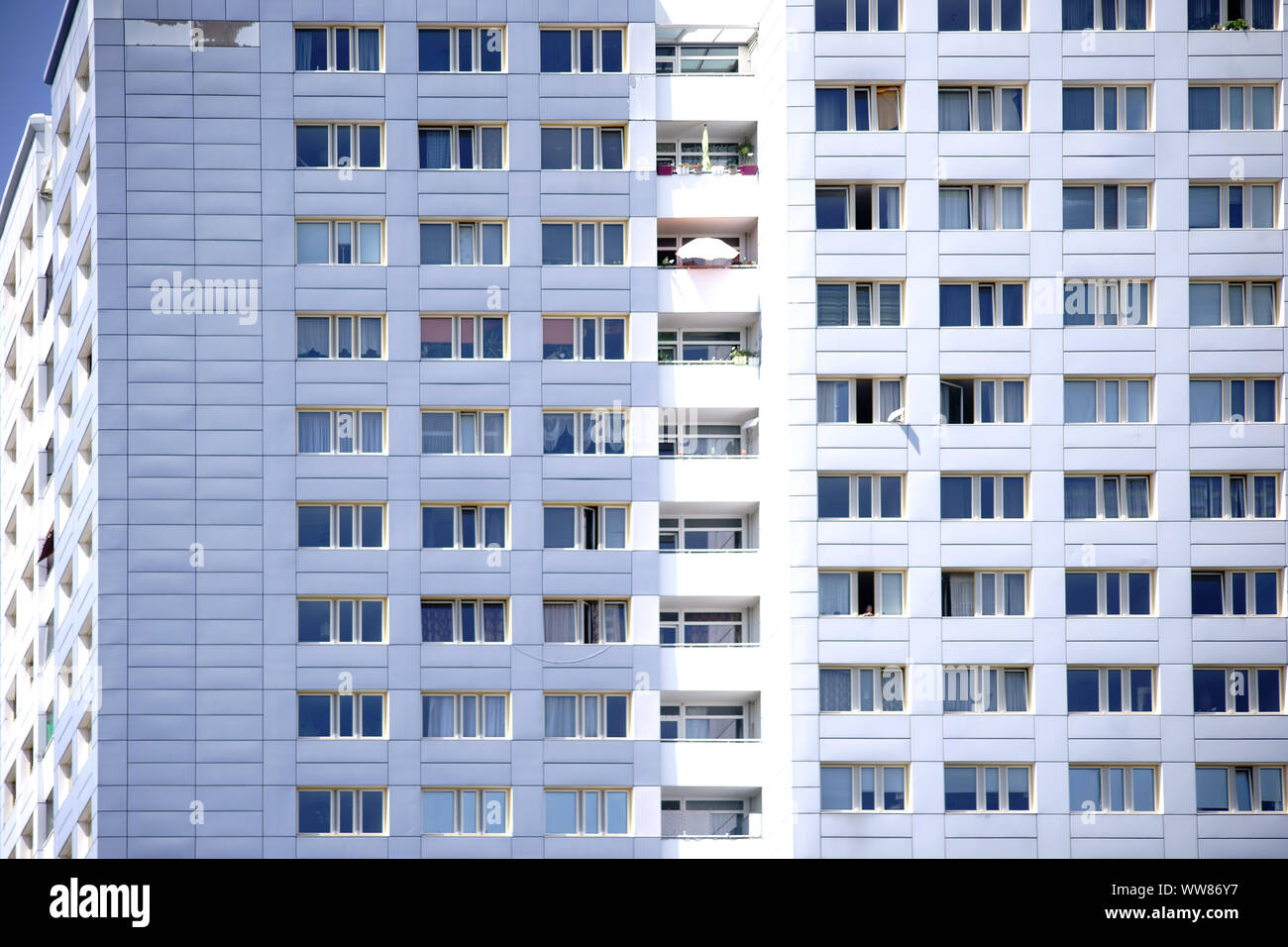 Window front of a high rise with flats and balconies Stock Photo - Alamy