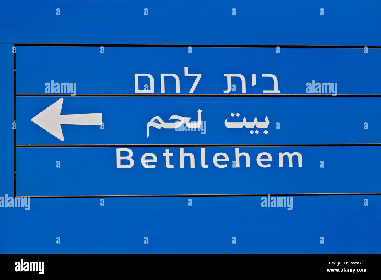 blue road sign with white inscription Bethlehem in three languages ...
