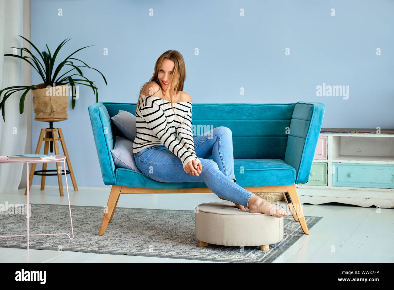 Cute girl at home relax and feeling happy Stock Photo - Alamy
