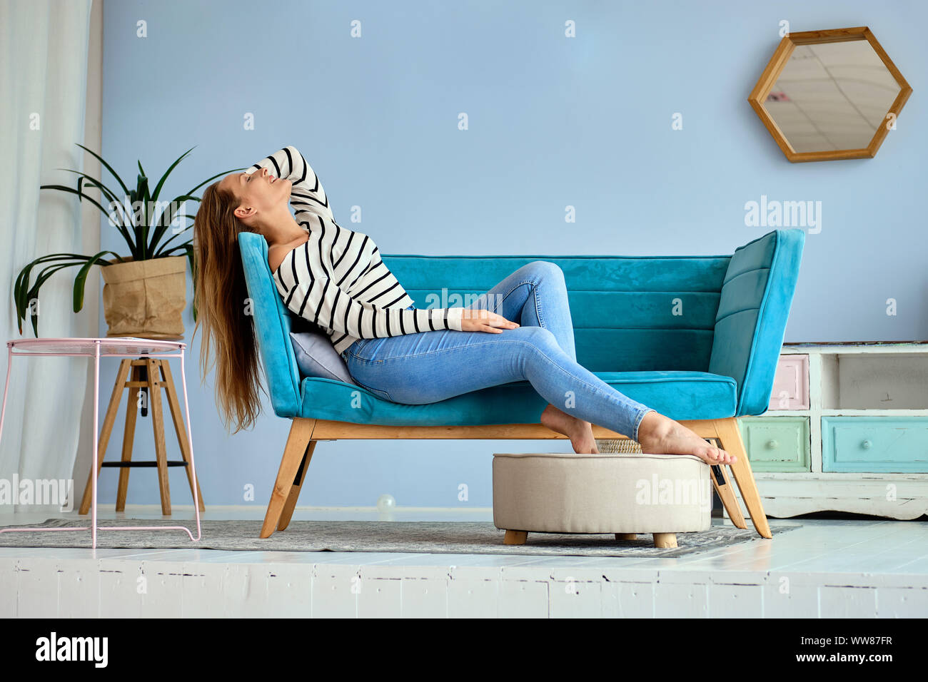 Cute girl at home relax and feeling happy Stock Photo - Alamy