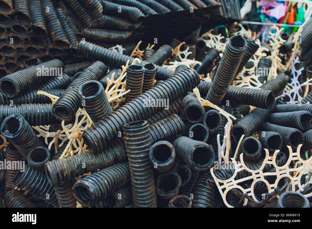 plastic pipe and materials for constructions waste sorting Stock Photo ...