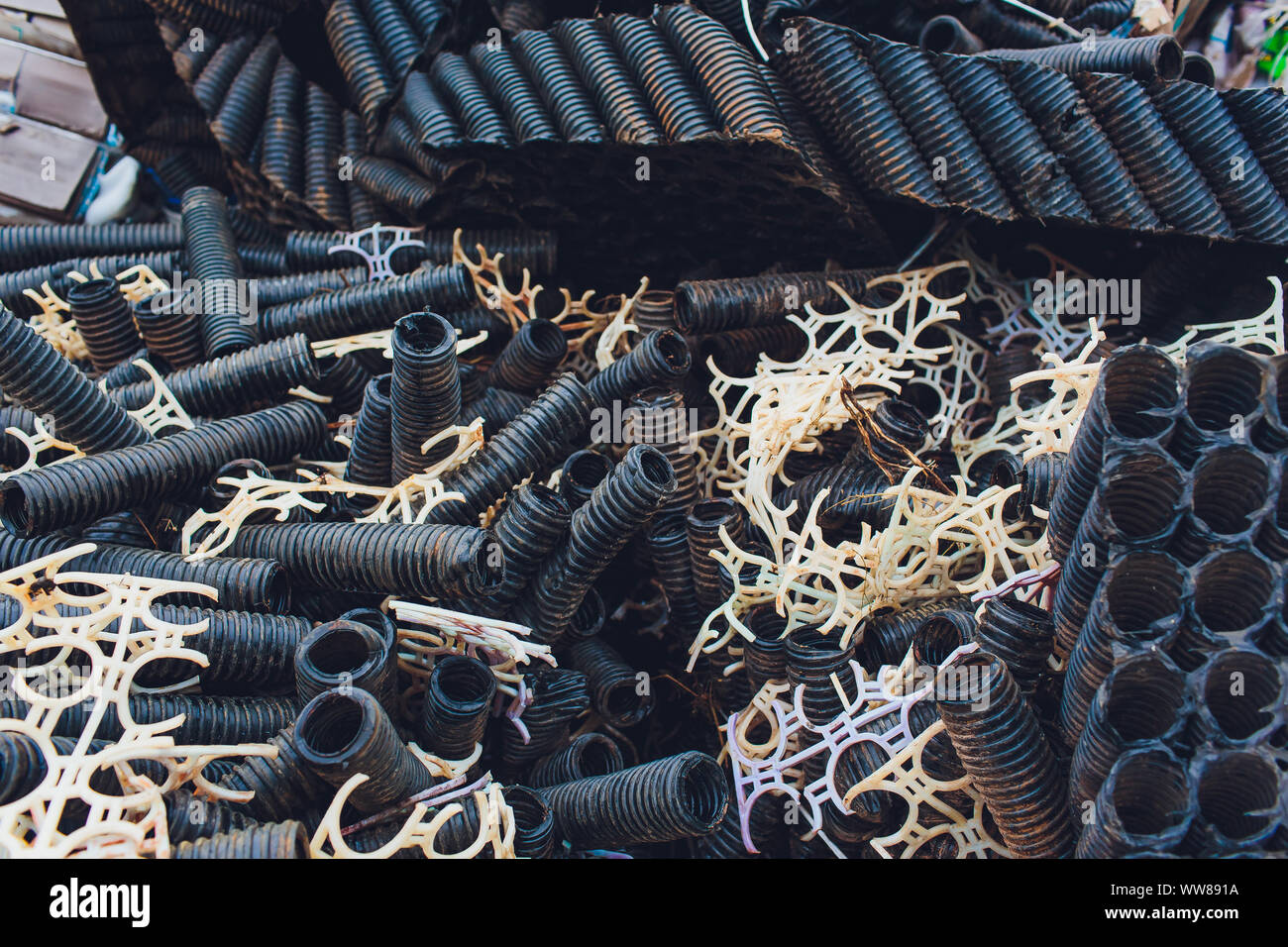 plastic pipe and materials for constructions waste sorting Stock Photo ...
