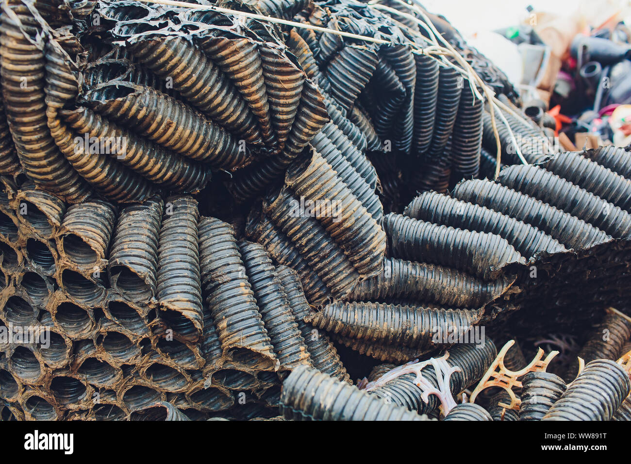 plastic pipe and materials for constructions waste sorting Stock Photo ...