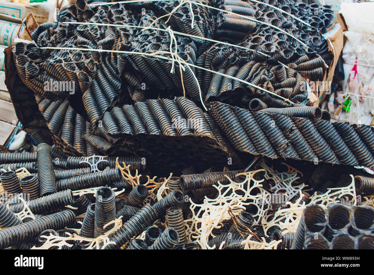 plastic pipe and materials for constructions waste sorting Stock Photo ...