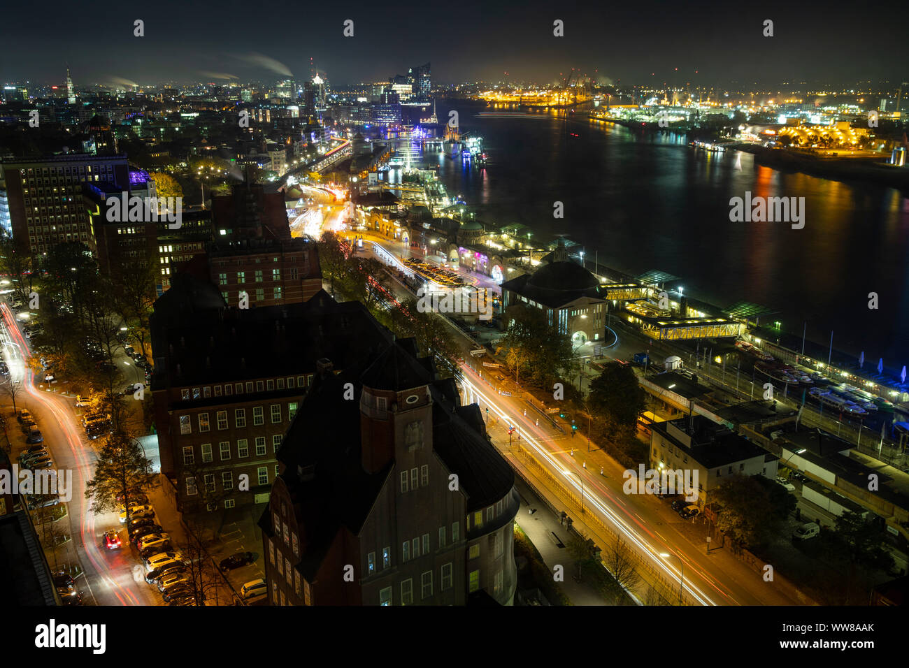 Europe, Germany, Hamburg, view to Elbe and landing stages at night from ...