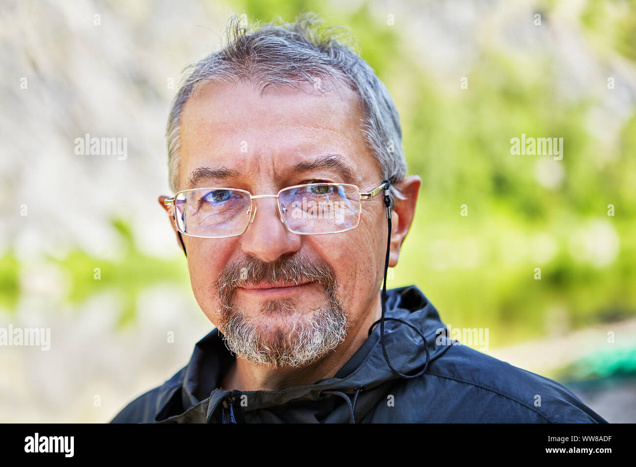 Close-up portrait of an intelligent man, with delicate facial features ...