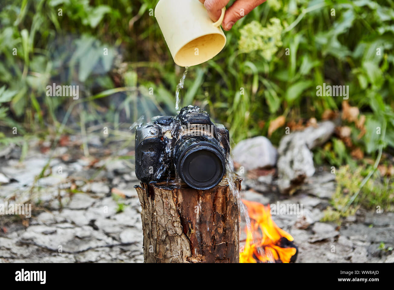 An unlucky photographer wanted to dry the camera near the fire of a ...