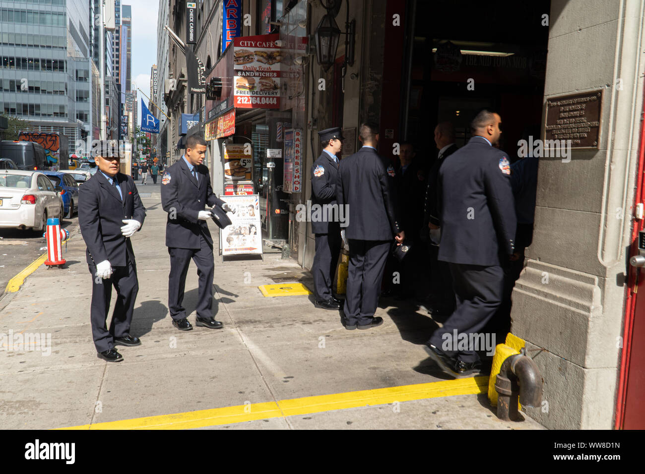 New York City Fire fighters getting ready to go to a Ceremony on ...