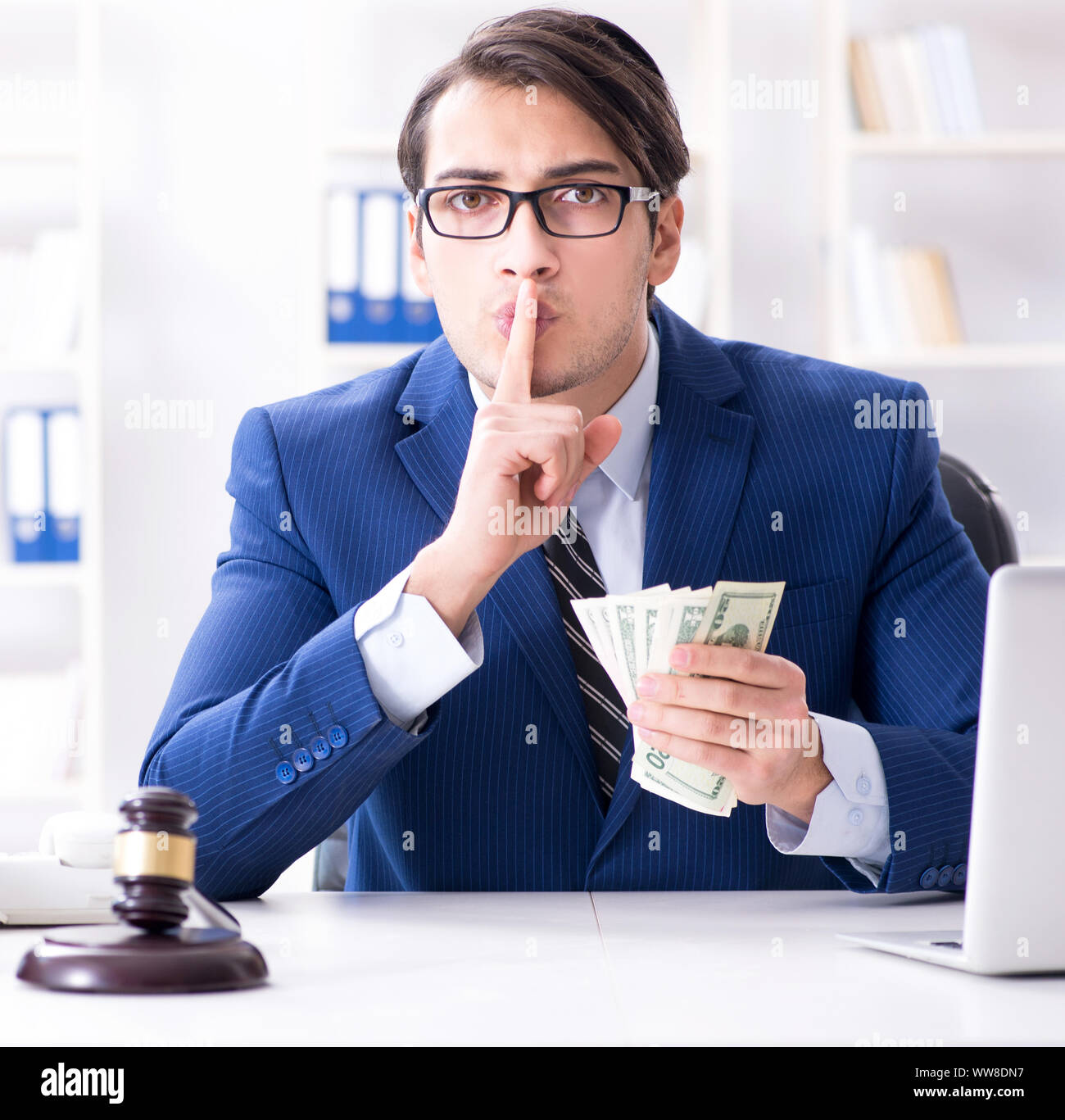 Lawyer receiving money as bribe hi-res stock photography and images - Alamy