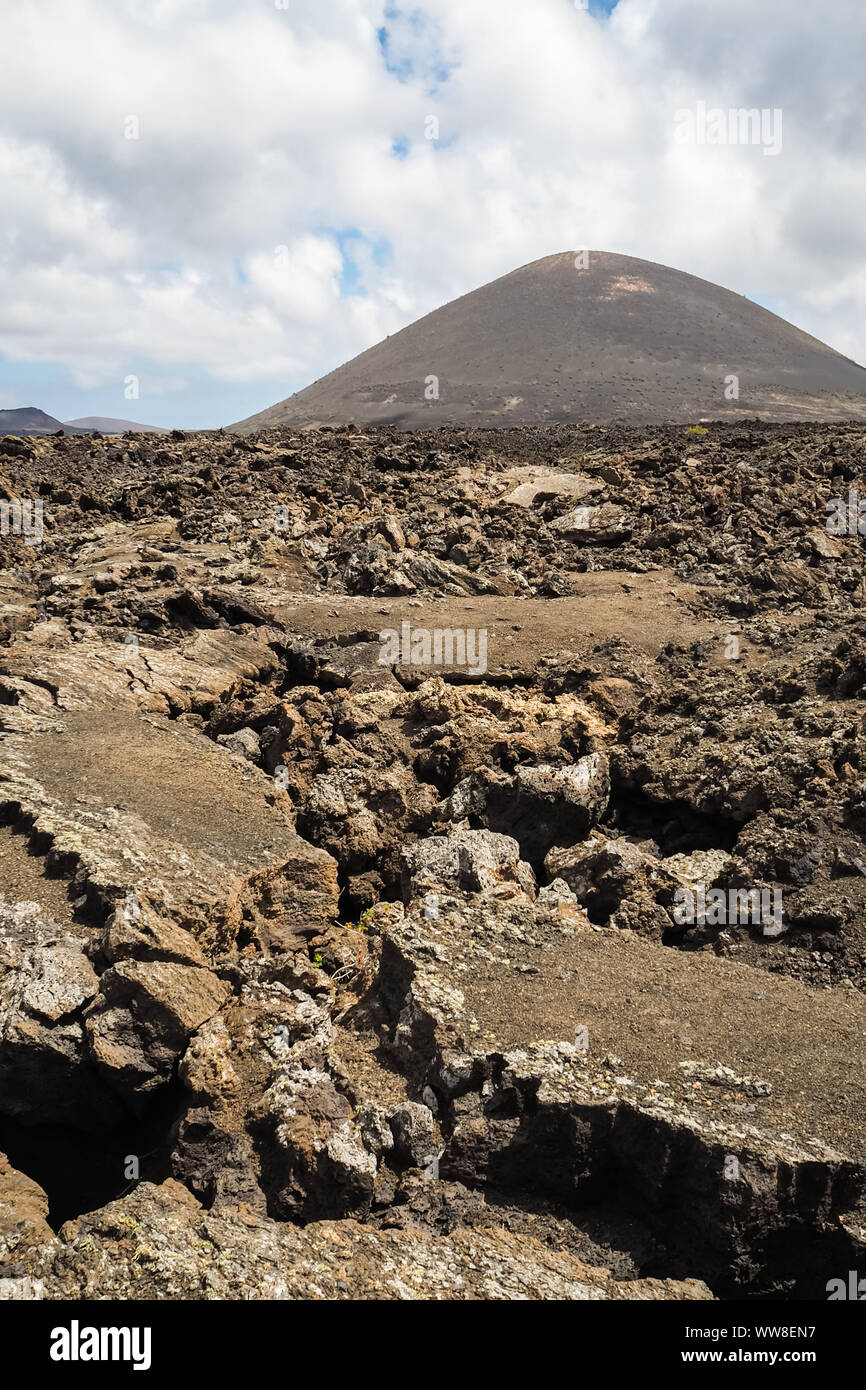 Steep path at the foot of a volcano on the island of Lanzarote Stock ...