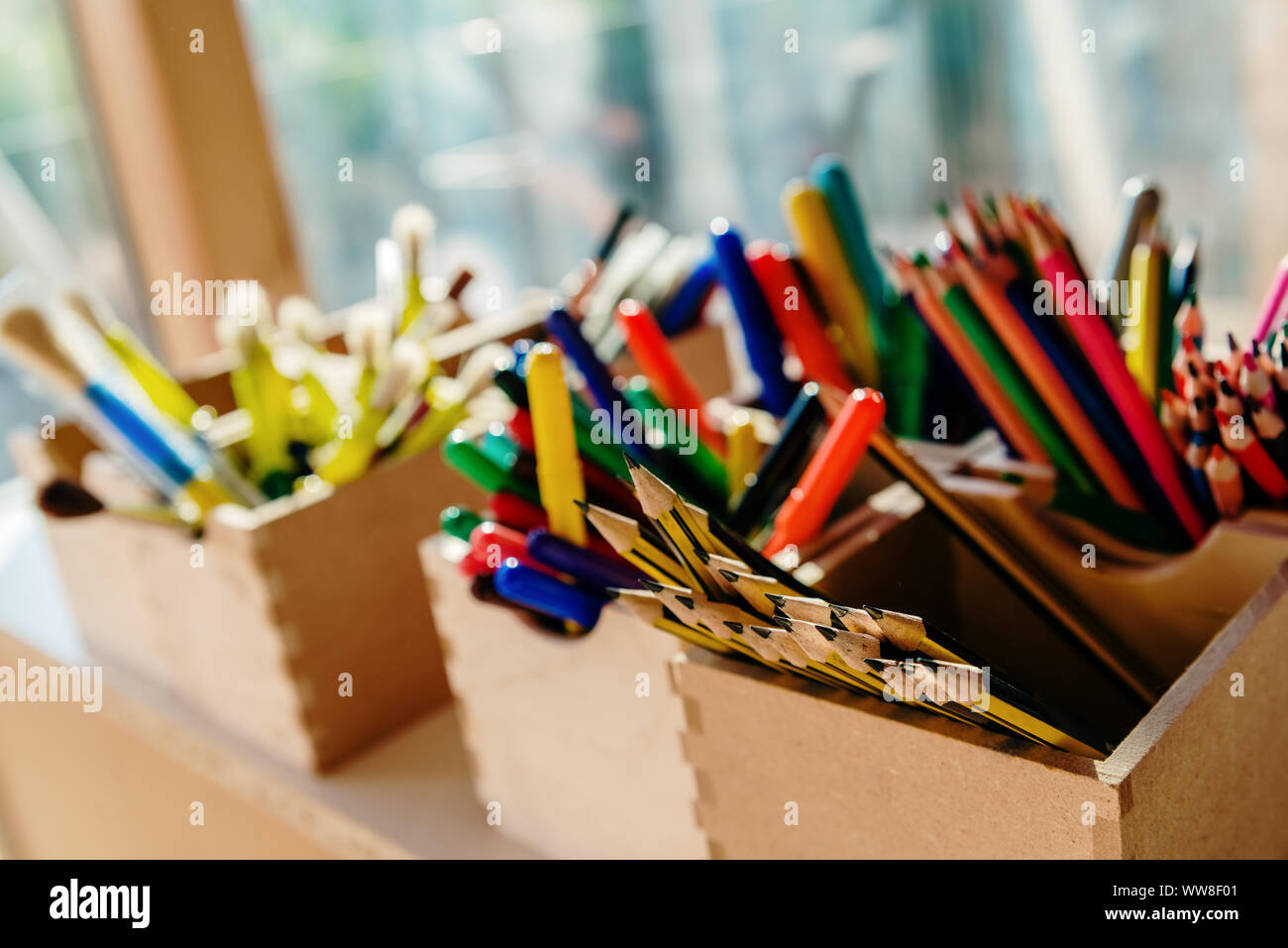 Boxes full of pencils and markers inside a classroom at a children's ...
