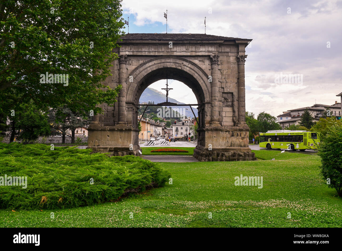 View of the Arch of Augustus in the centre of the Alpine city of Aosta ...