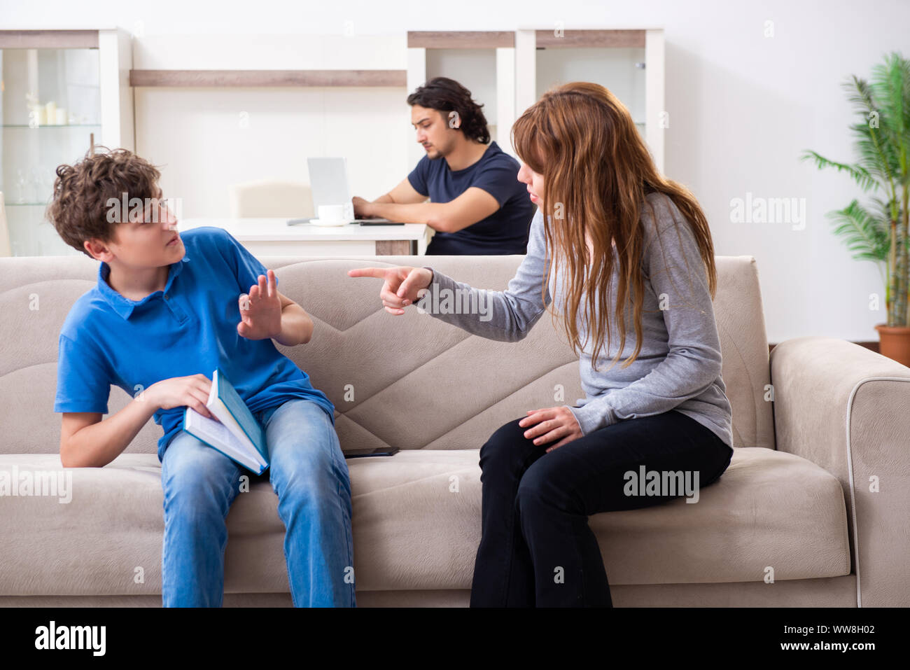 The concept of underage smoking with young boy and family Stock Photo ...