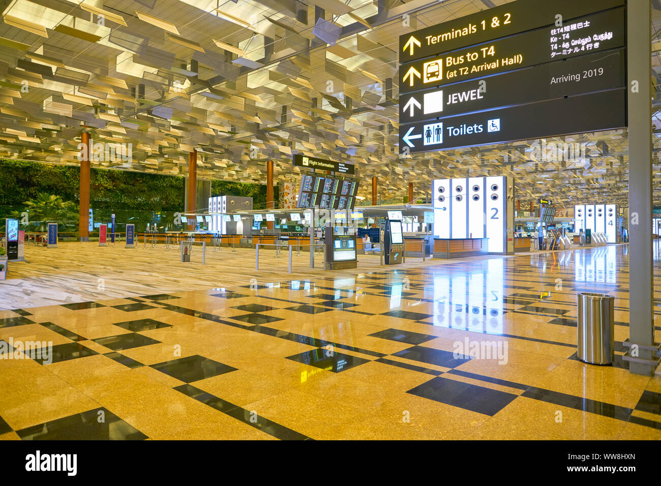 SINGAPORE - CIRCA APRIL, 2019: check-in area at Singapore Changi ...