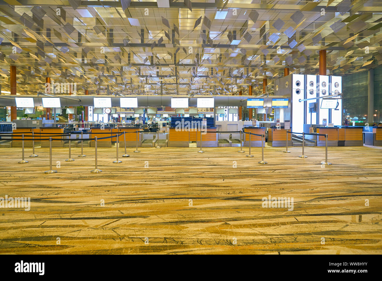 SINGAPORE - CIRCA APRIL, 2019: check-in area at Singapore Changi ...