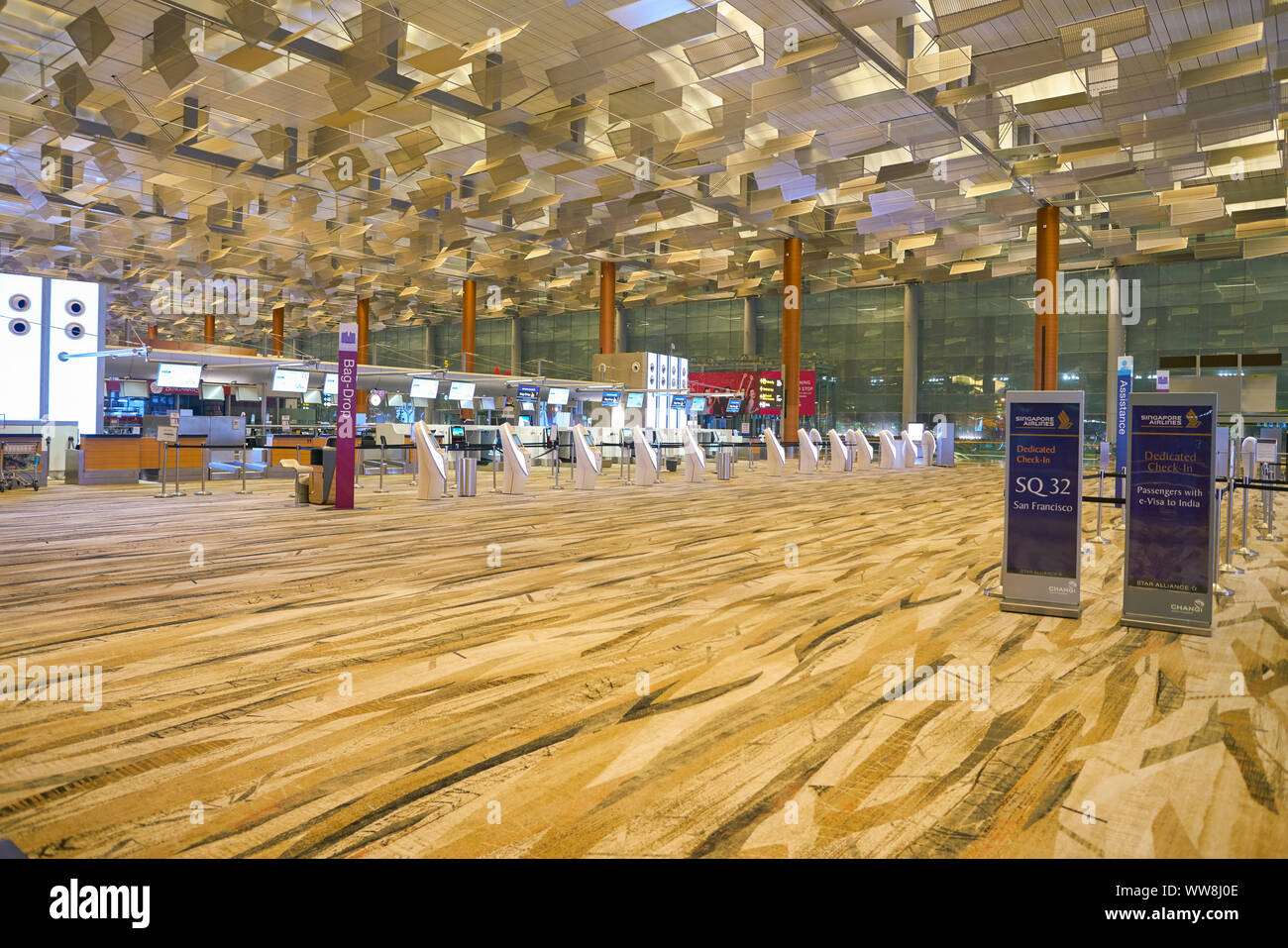 SINGAPORE - CIRCA APRIL, 2019: check-in area at Singapore Changi ...