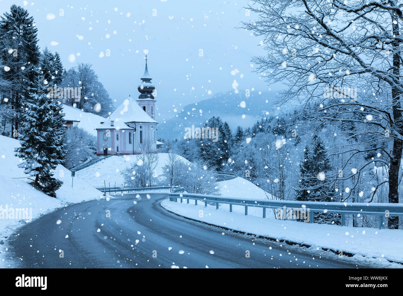 Pilgrimage church Maria Gern in winter under a snowfall, Berchtesgaden ...