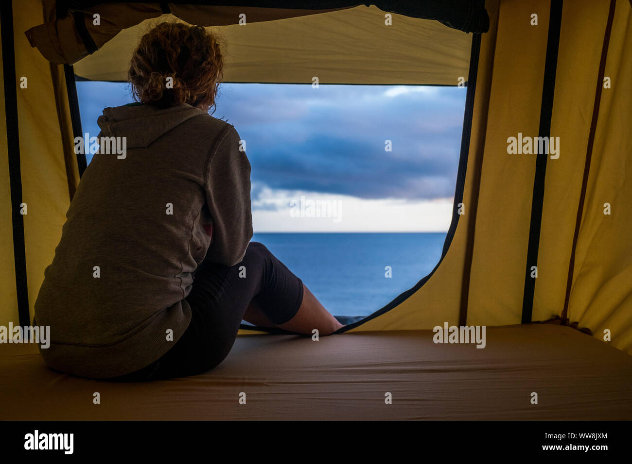Woman in roof tent hi-res stock photography and images - Alamy