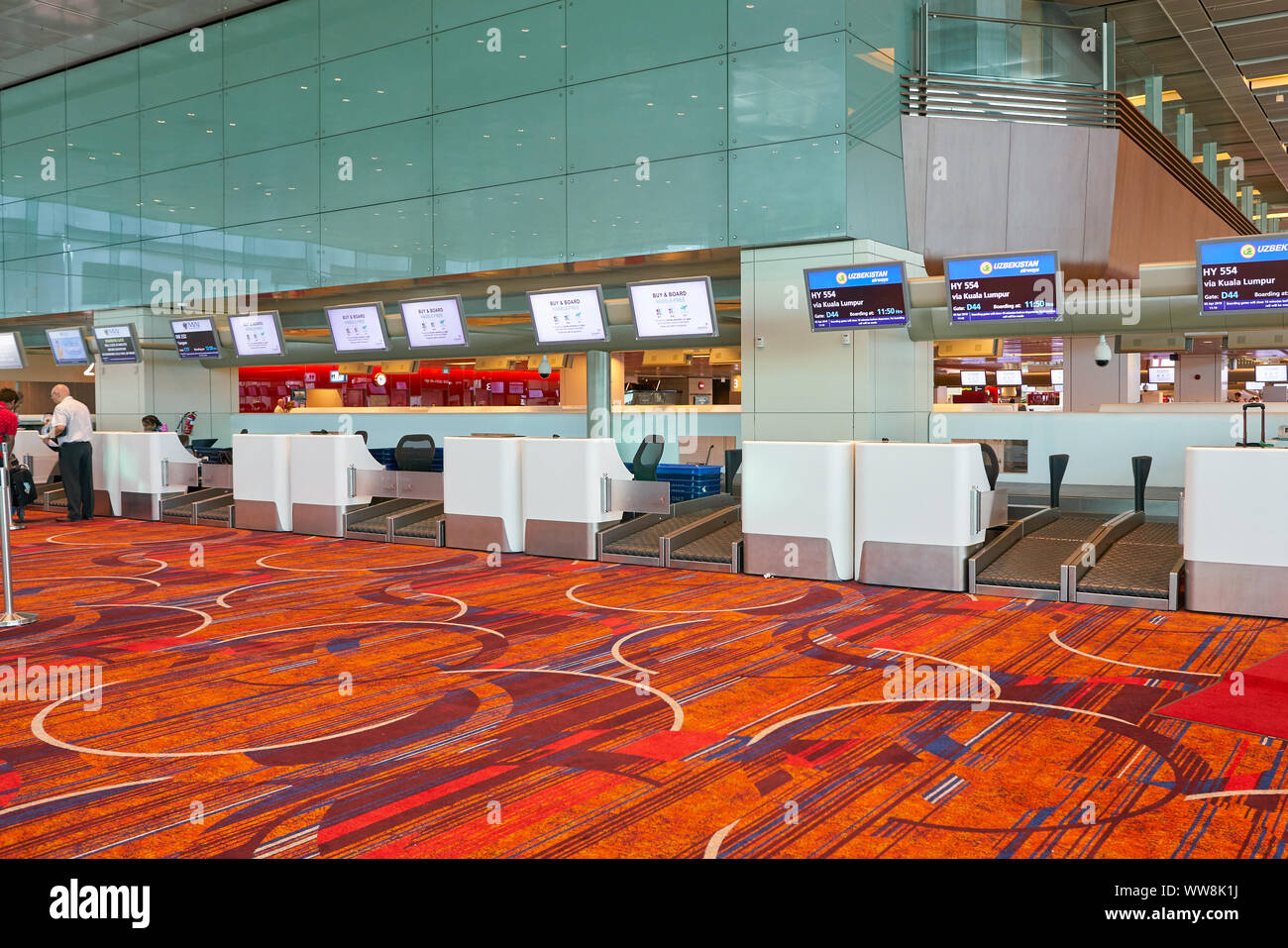 SINGAPORE - CIRCA APRIL, 2019: check-in area at Singapore Changi ...