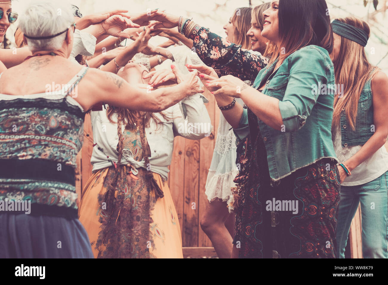 group of free and hippy rebel alternative style young women together ...