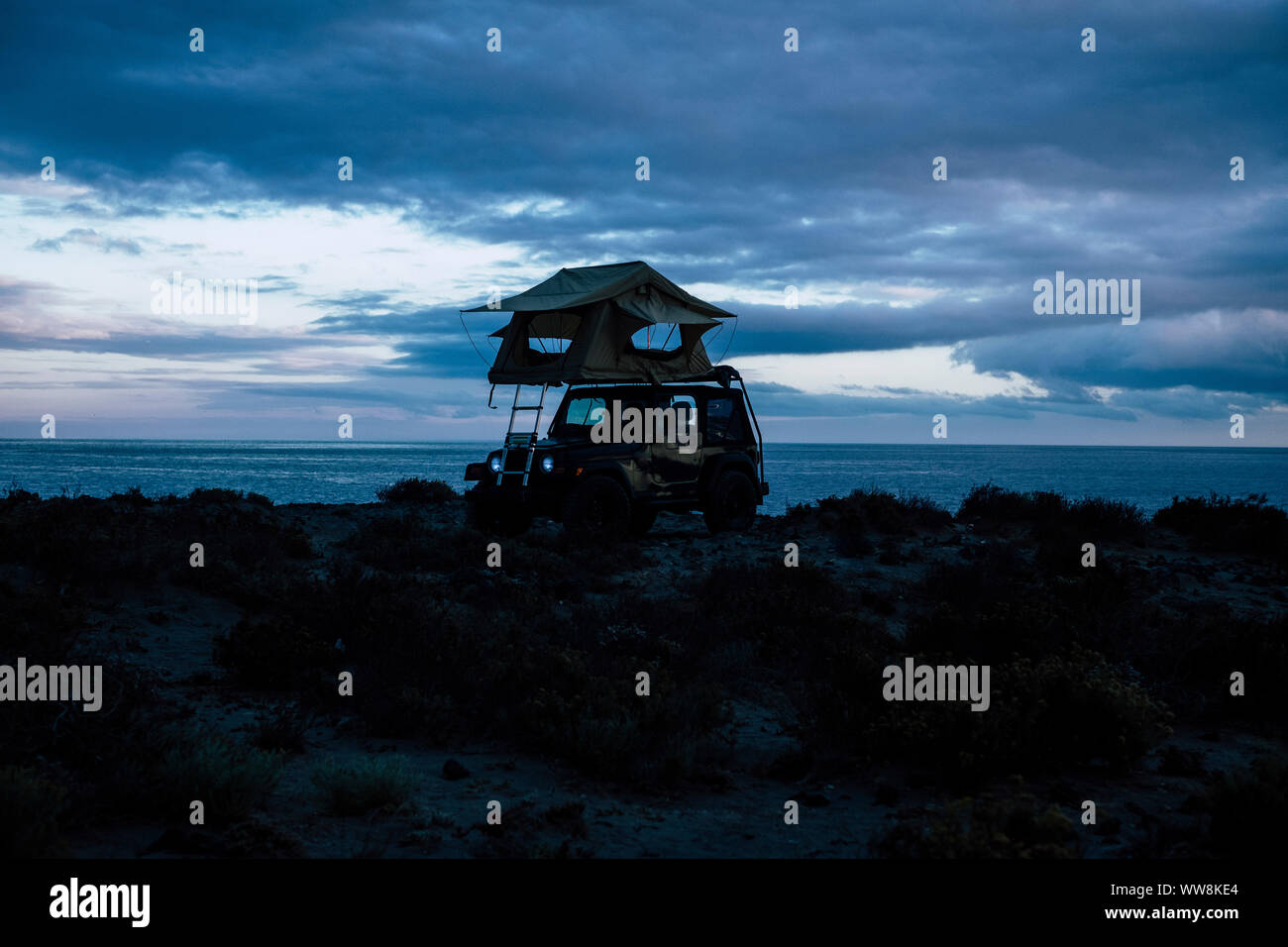 black off road beautiful adventurer car vehicle with roof tent tiny ...