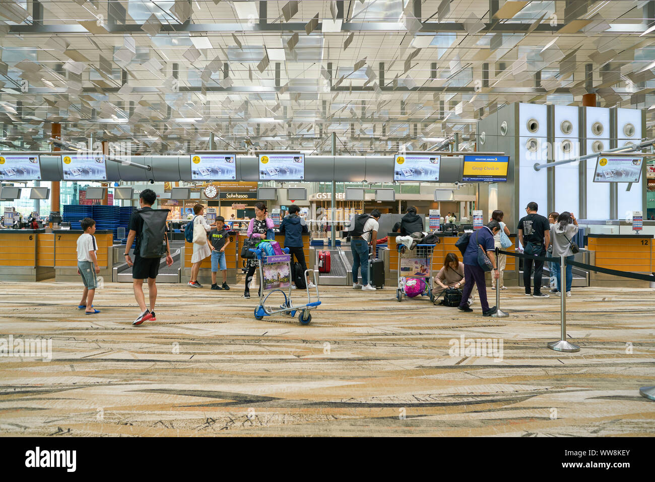 SINGAPORE - CIRCA APRIL, 2019: check-in area at Singapore Changi ...