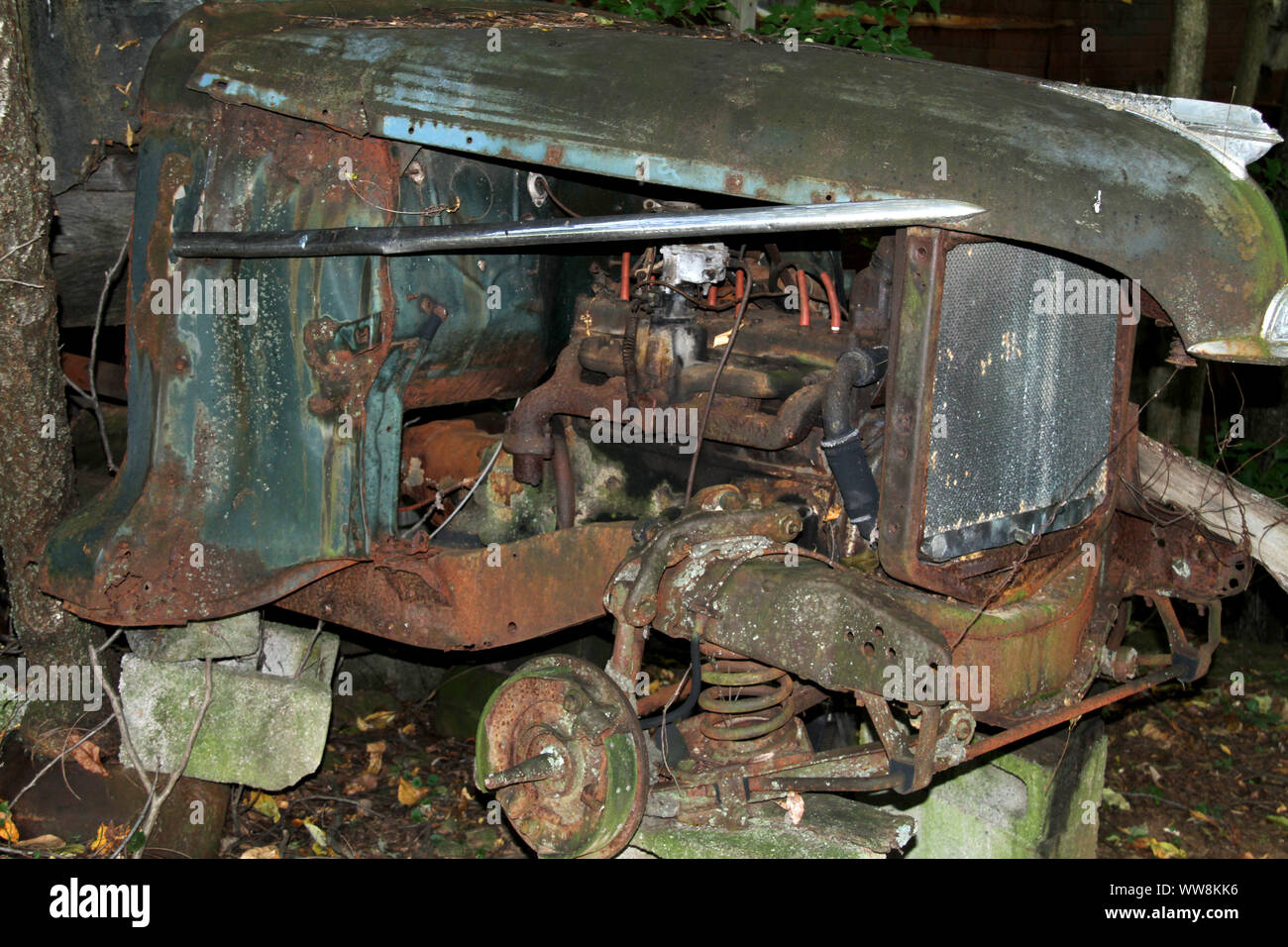 Old abandoned rusty tractor Stock Photo - Alamy