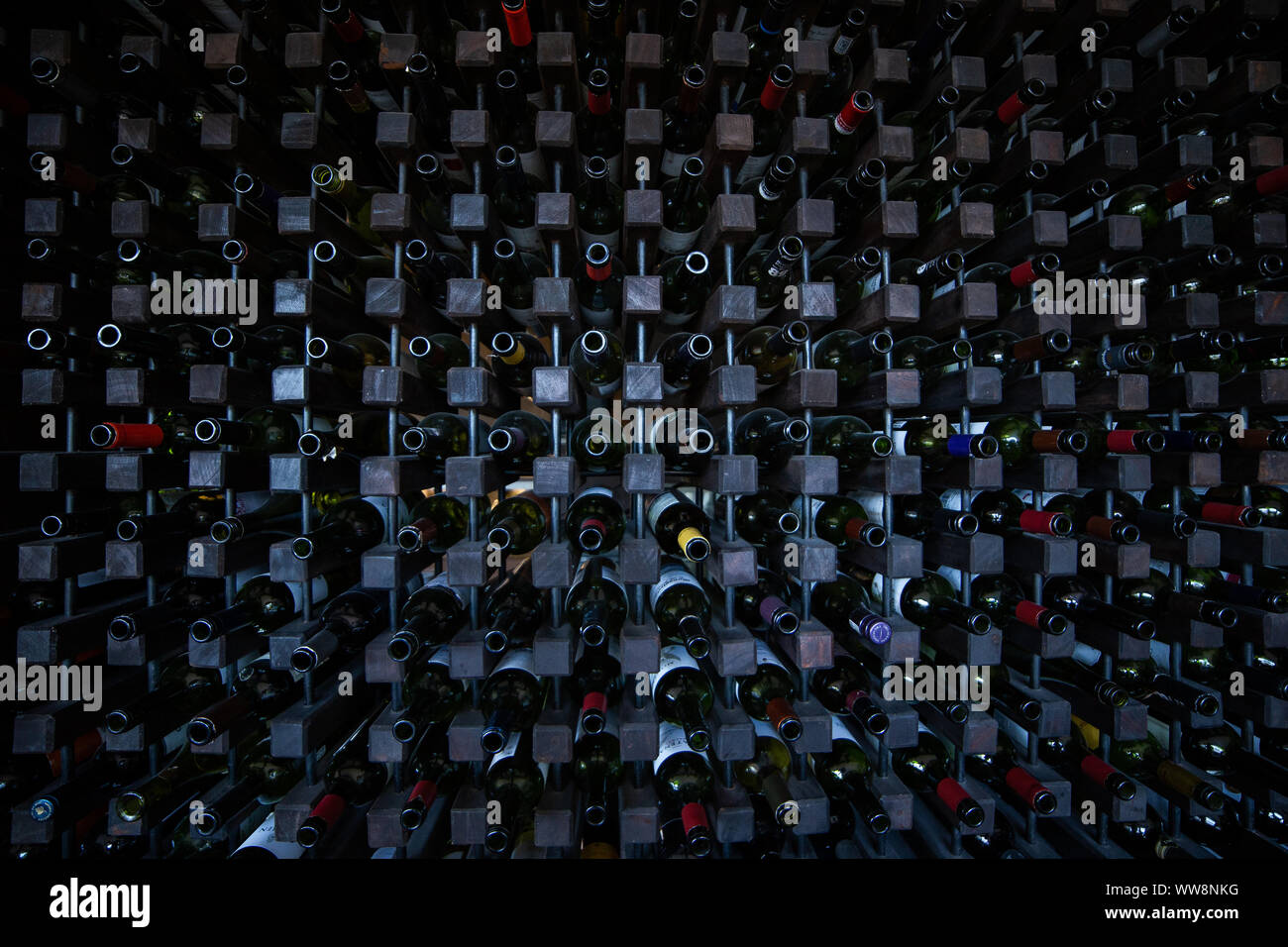 Fish eye shot of bottles in wine cellar Stock Photo - Alamy