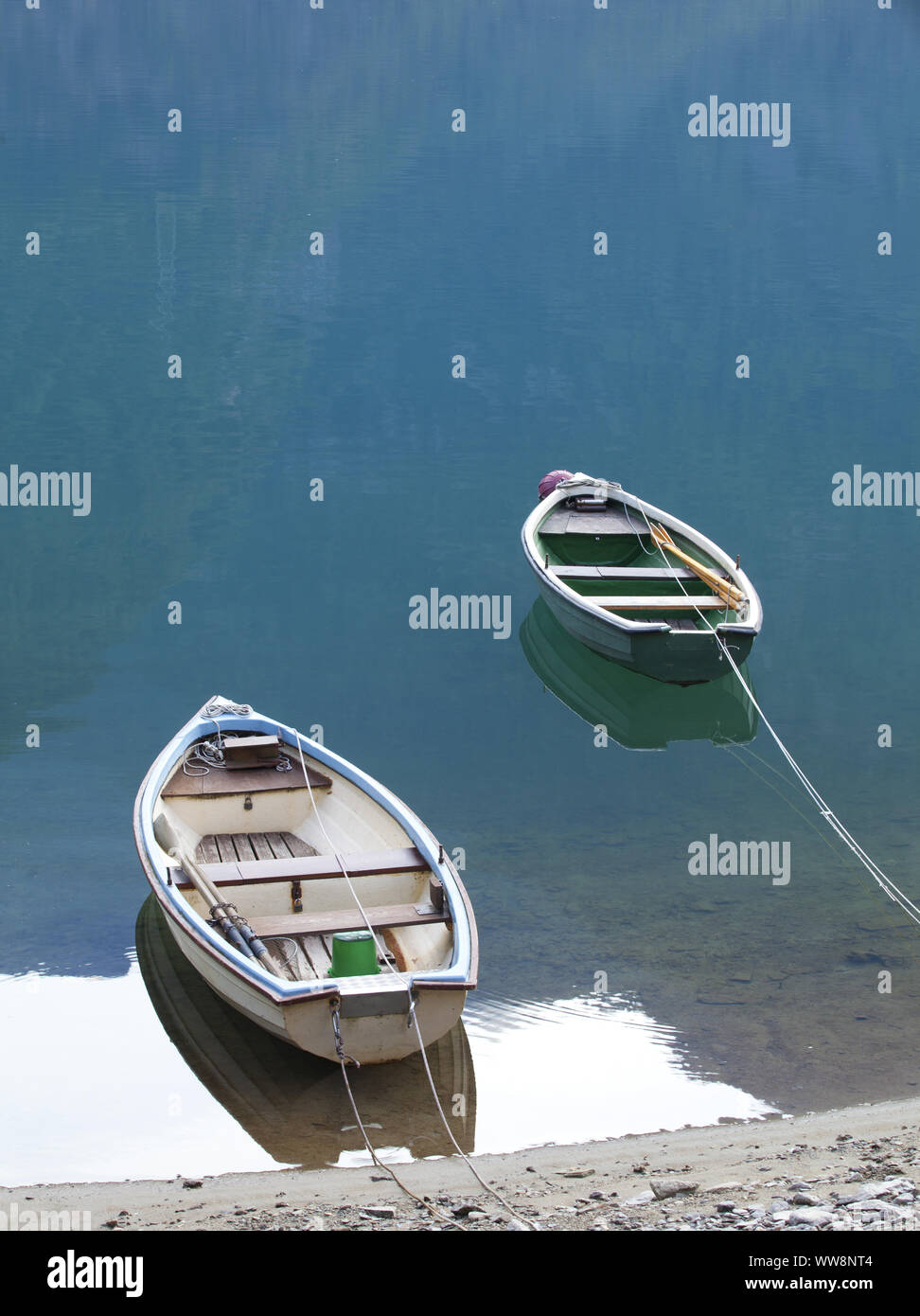 Fishing boats on the shores of Lake Poschiavo, Le Prese, Poschiavo ...