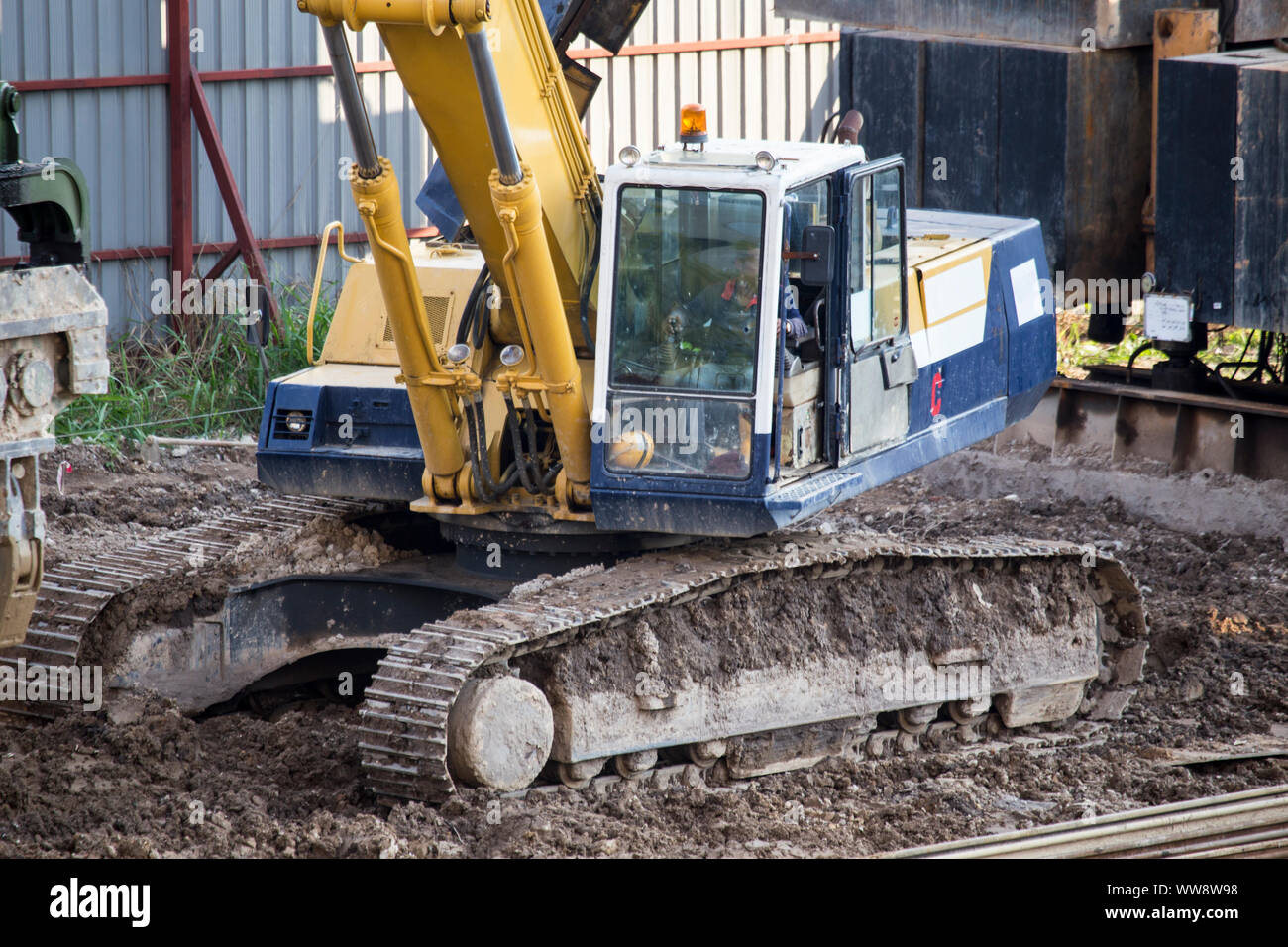 Open construction work site with heavy machinery equipment construction ...