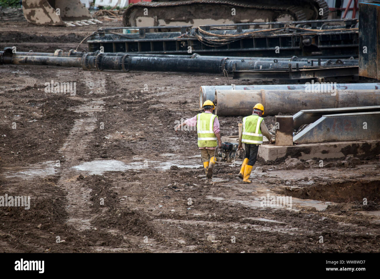 Open construction work site with heavy machinery equipment construction ...