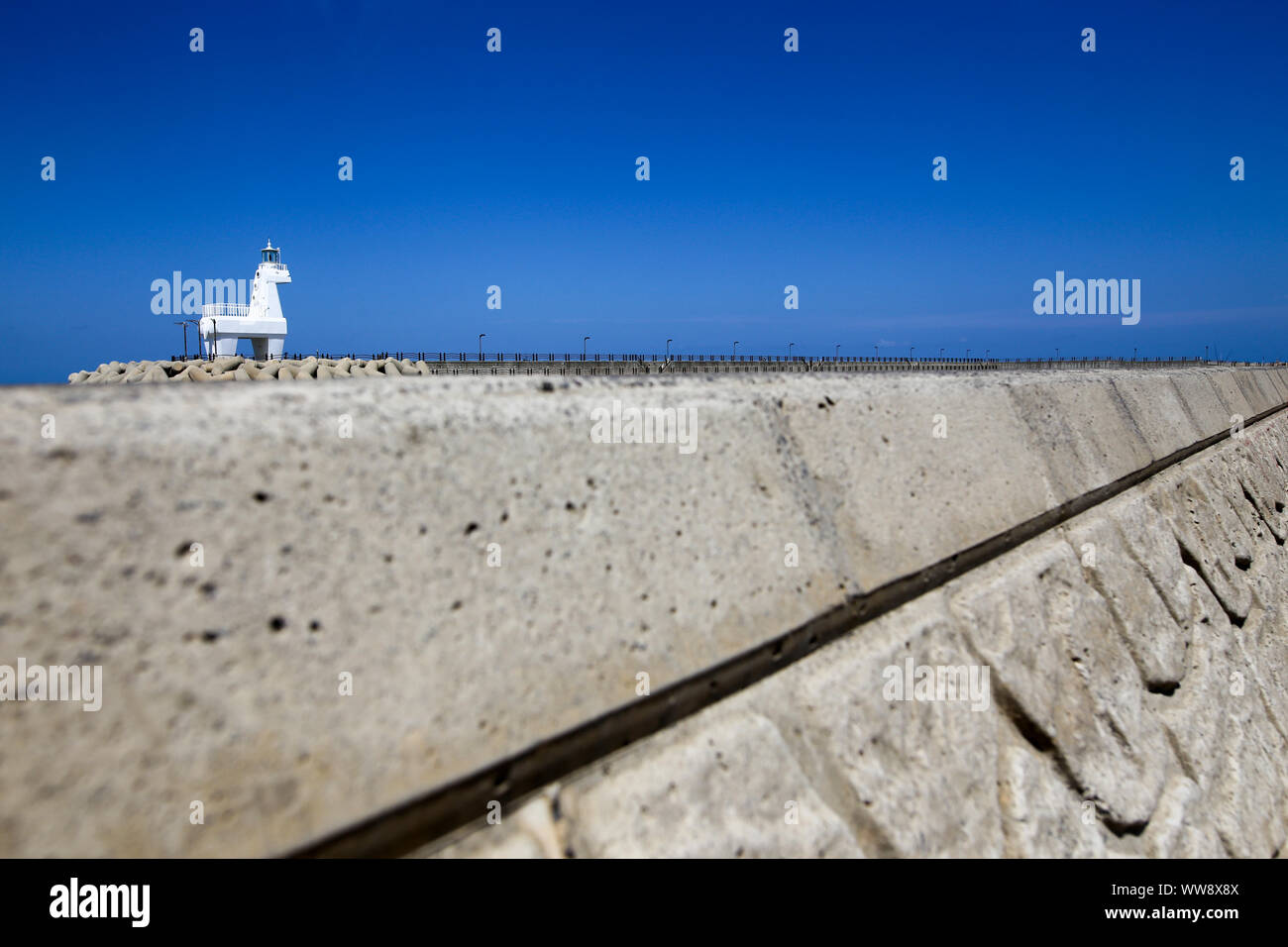 Iho Lighthouse at Iho Tewoo beach in the North of Jeju South Korea Asia ...