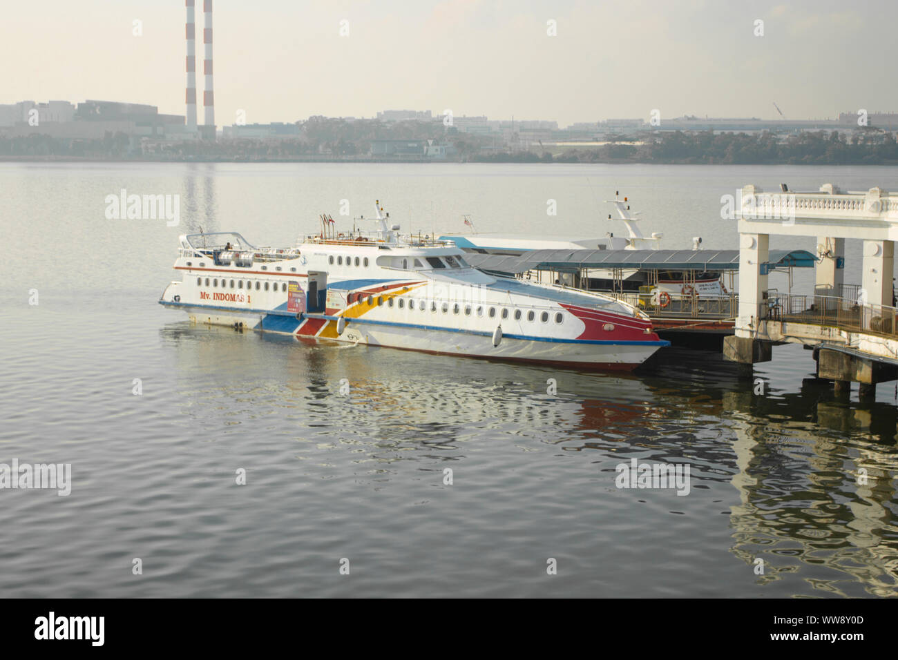 BATAM, INDONESIA - 12 DECEMBER 2018: Ferry and ships transporting ...