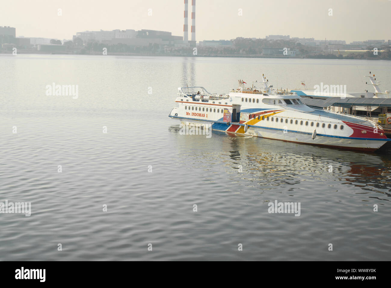BATAM, INDONESIA - 12 DECEMBER 2018: Ferry and ships transporting ...