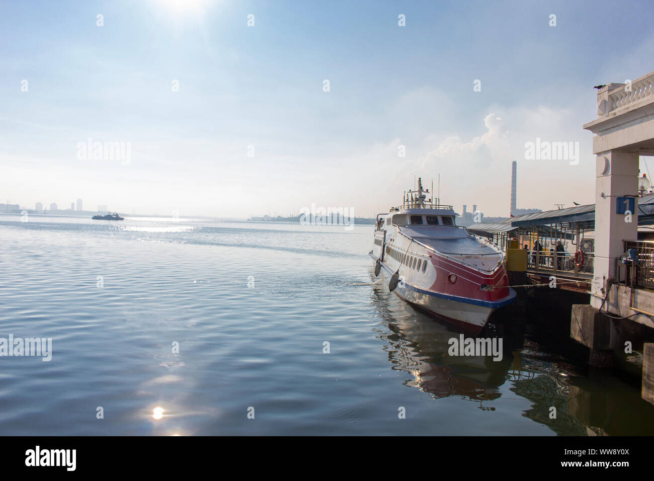 BATAM, INDONESIA - 12 DECEMBER 2018: Ferry and ships transporting ...