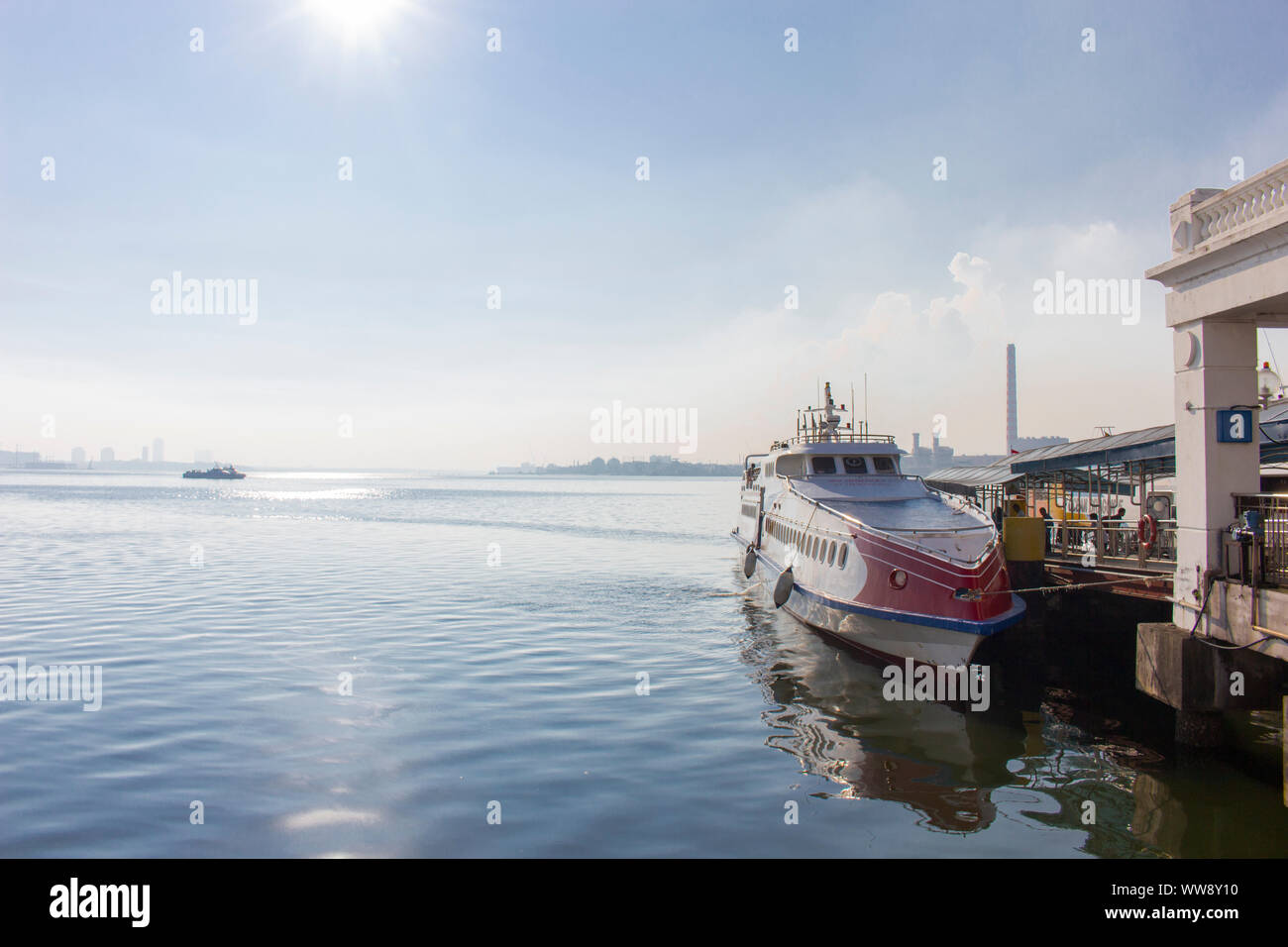 BATAM, INDONESIA - 12 DECEMBER 2018: Ferry and ships transporting ...