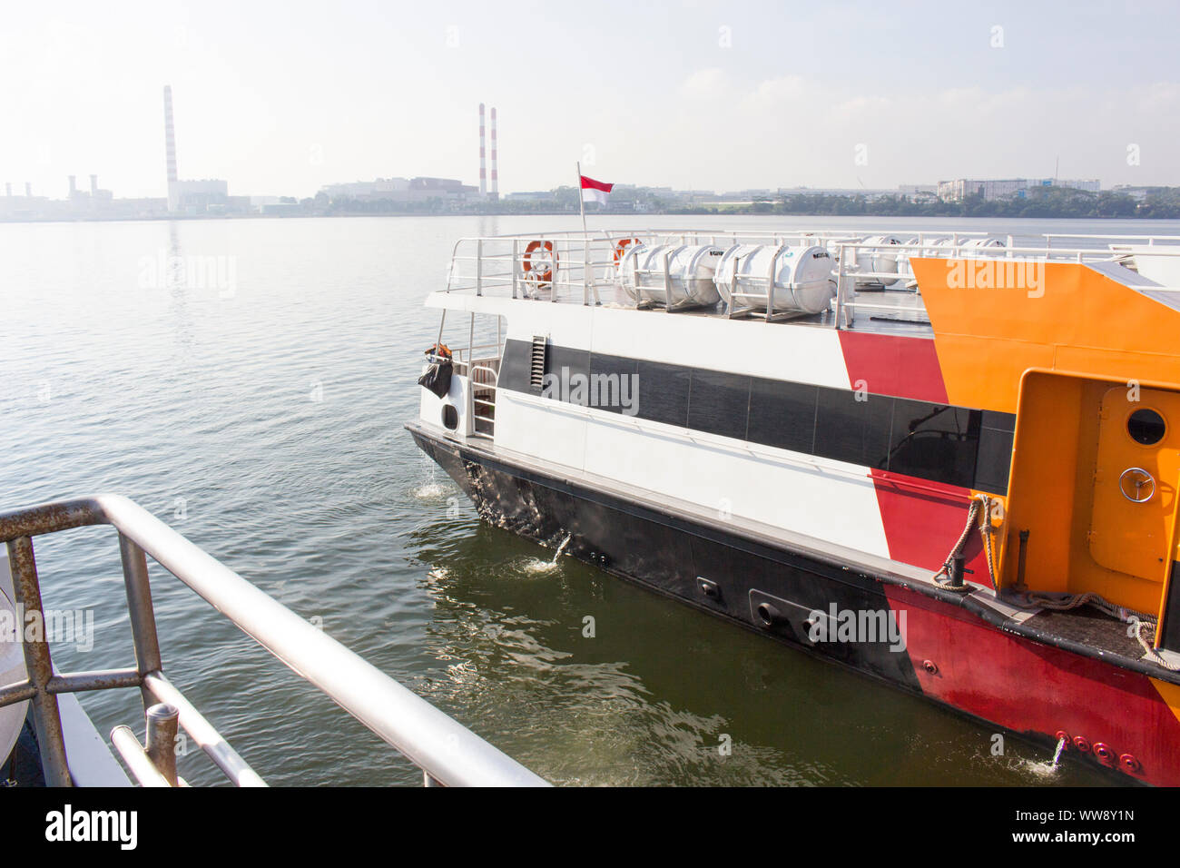 BATAM, INDONESIA - 12 DECEMBER 2018: Ferry and ships transporting ...