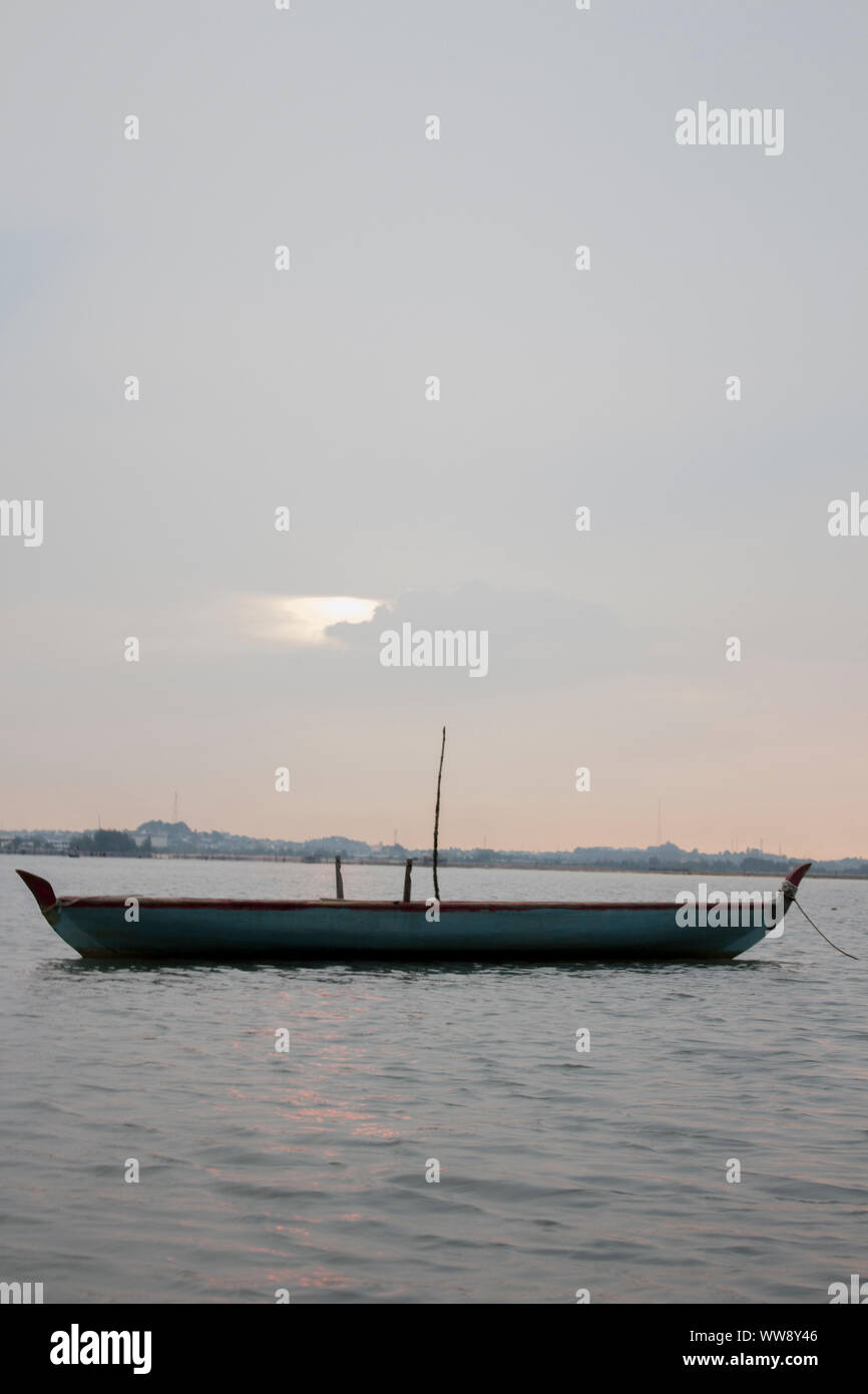 POV for boat sailing in river in Batam, Indonesia during sunset and ...