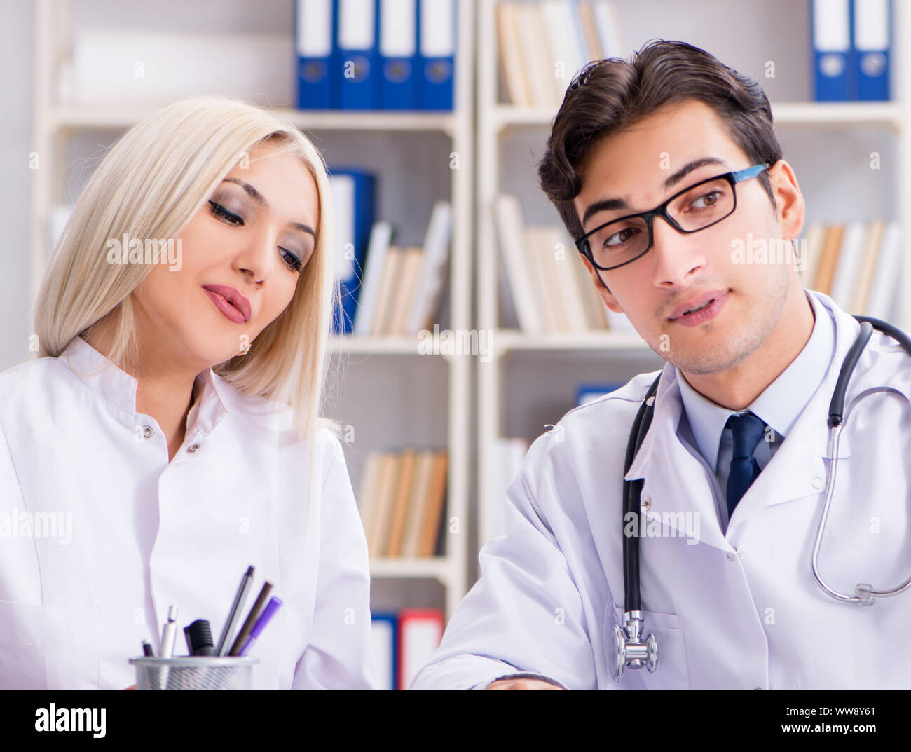 The male and female doctor having discussion in hospital Stock Photo ...