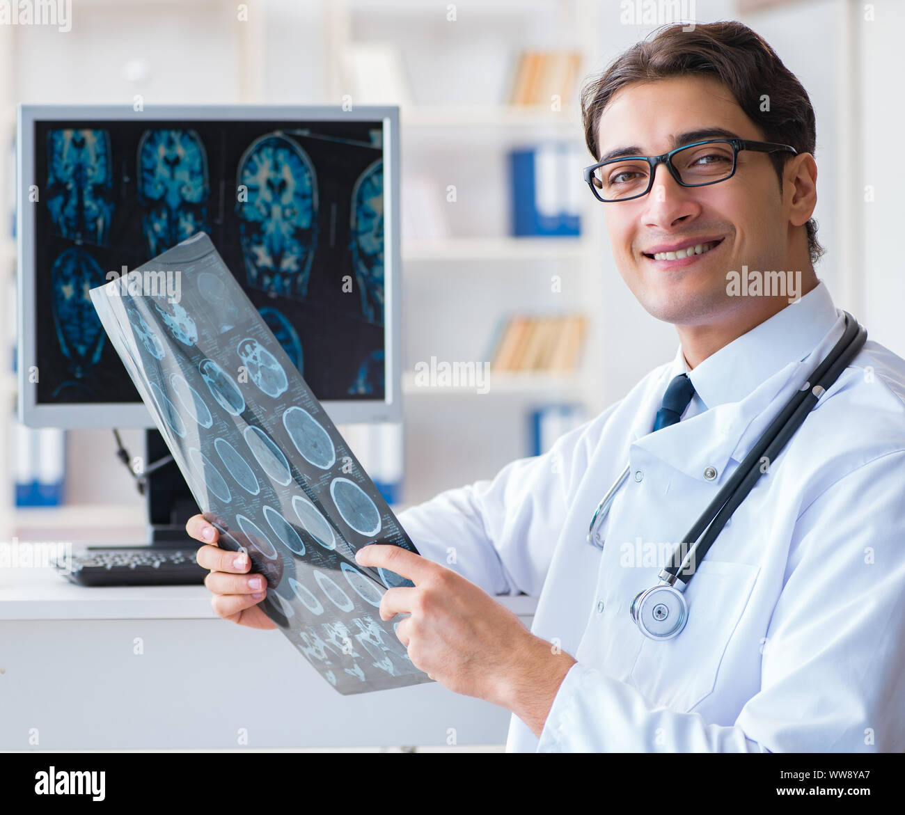 The doctor radiologist looking at x-ray images Stock Photo - Alamy