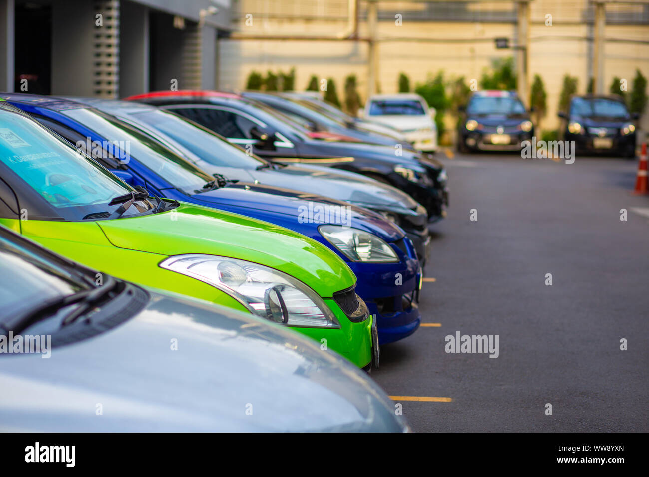 Car parking lot in modern condominium colorful car close up Stock Photo ...
