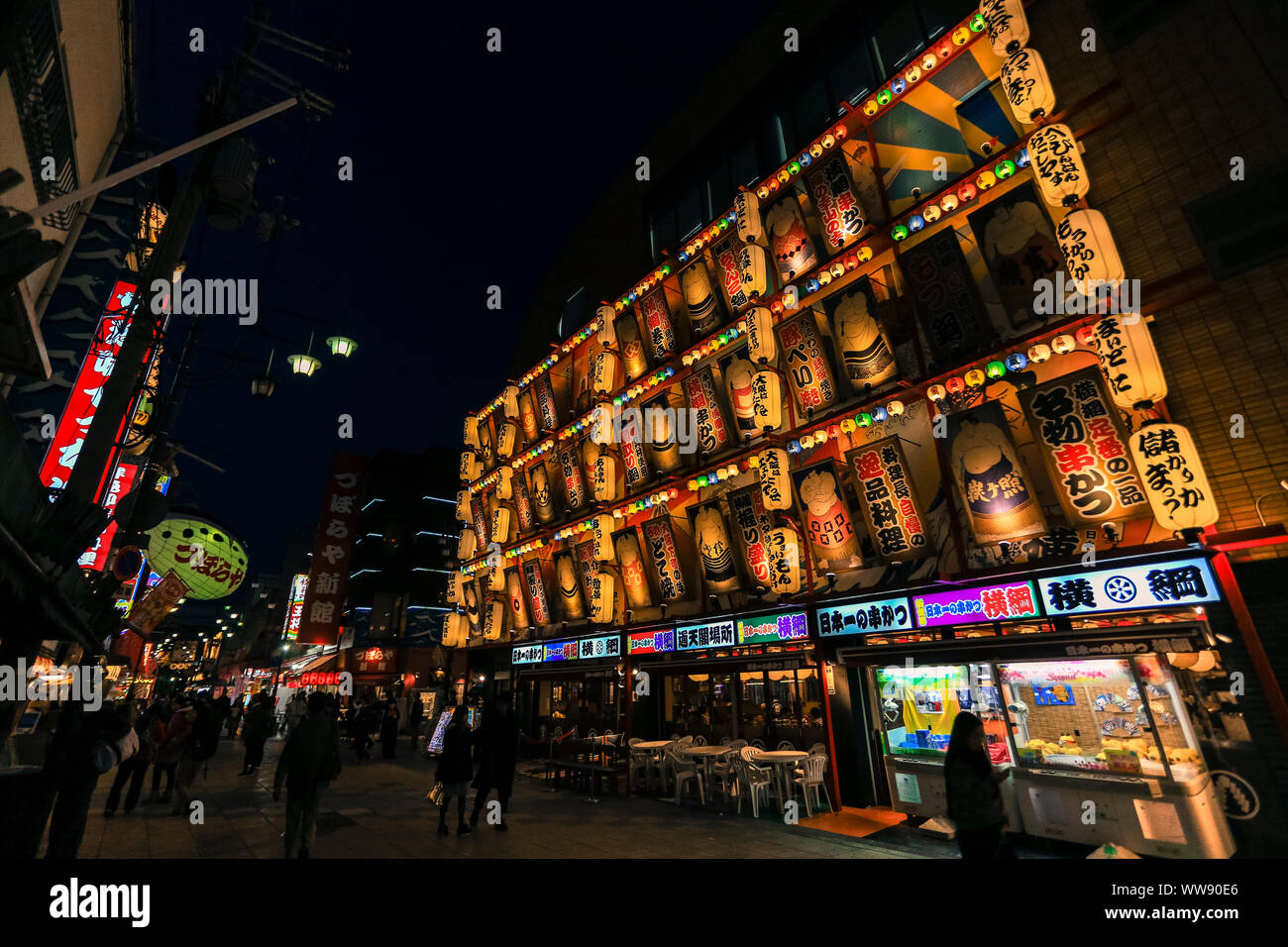 Shinsekai osaka japan street view at night with colorful neon lights ...