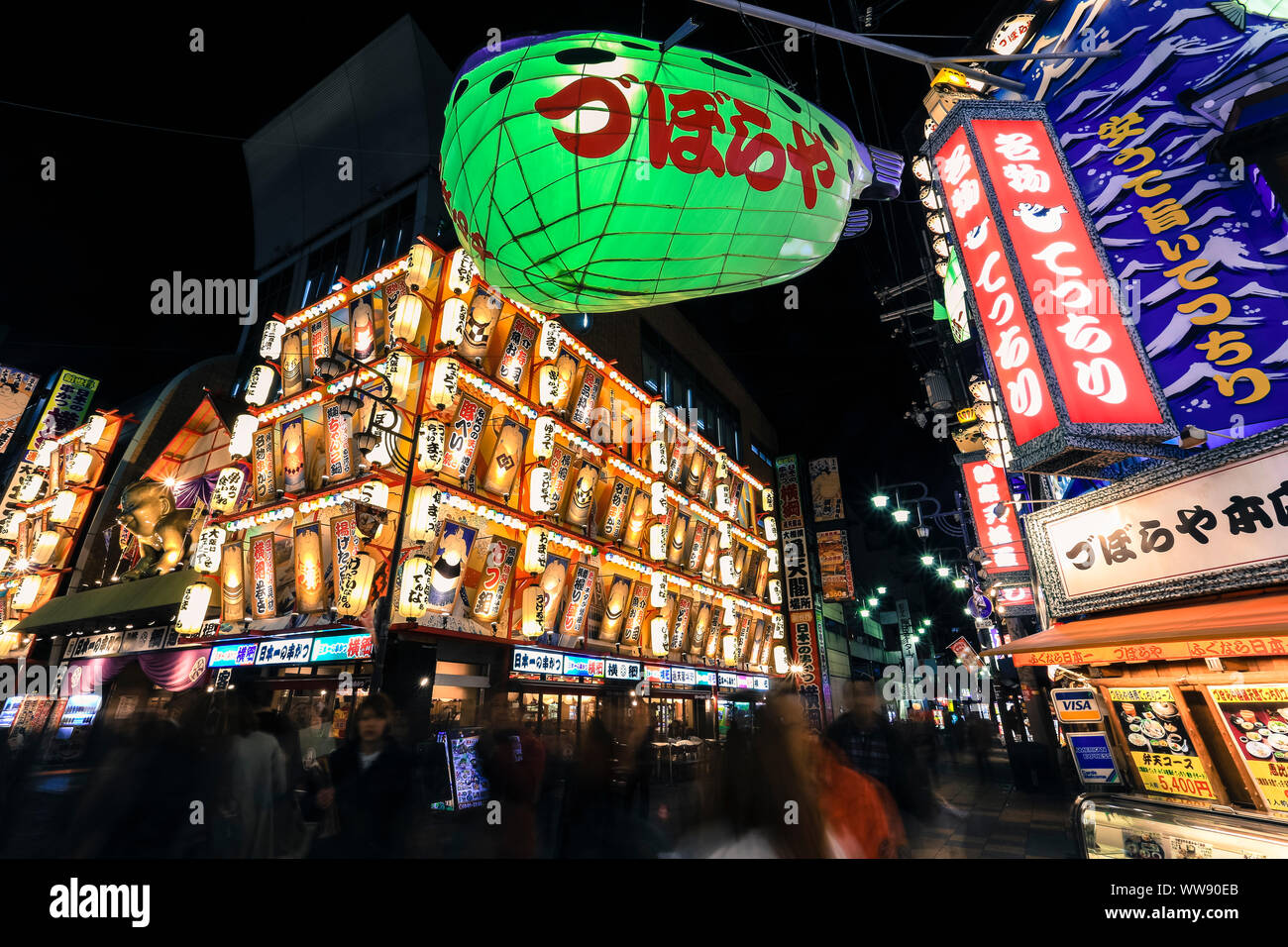 Shinsekai osaka japan street view at night with colorful neon lights ...