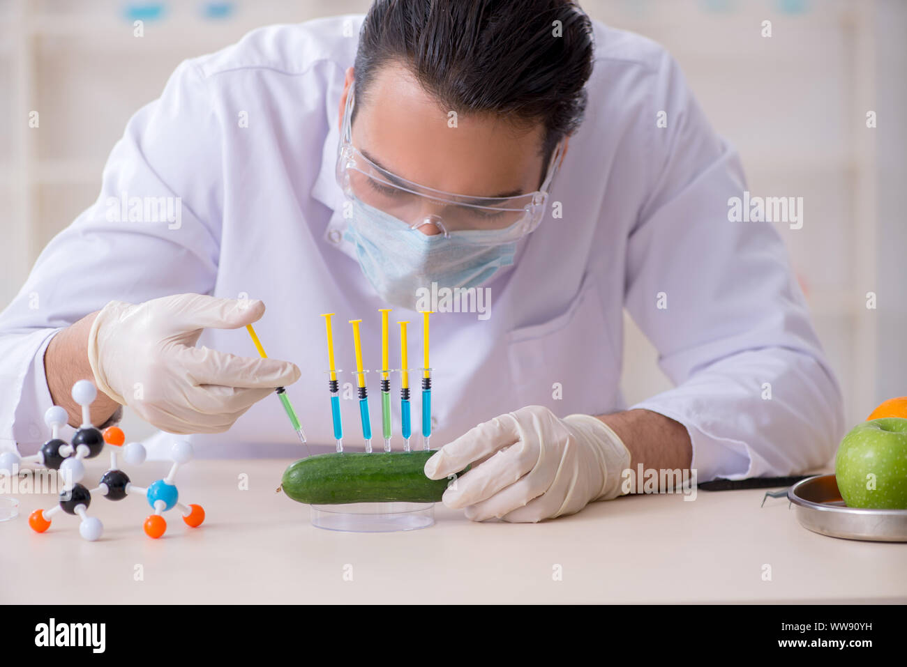 The male nutrition expert testing food products in lab Stock Photo - Alamy