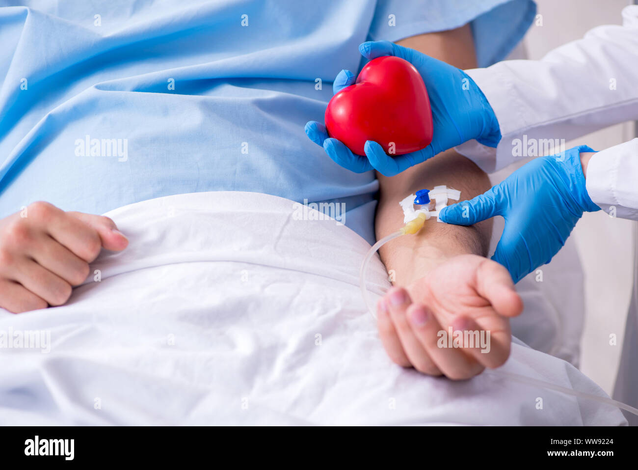 The male patient getting blood transfusion in hospital clinic Stock ...