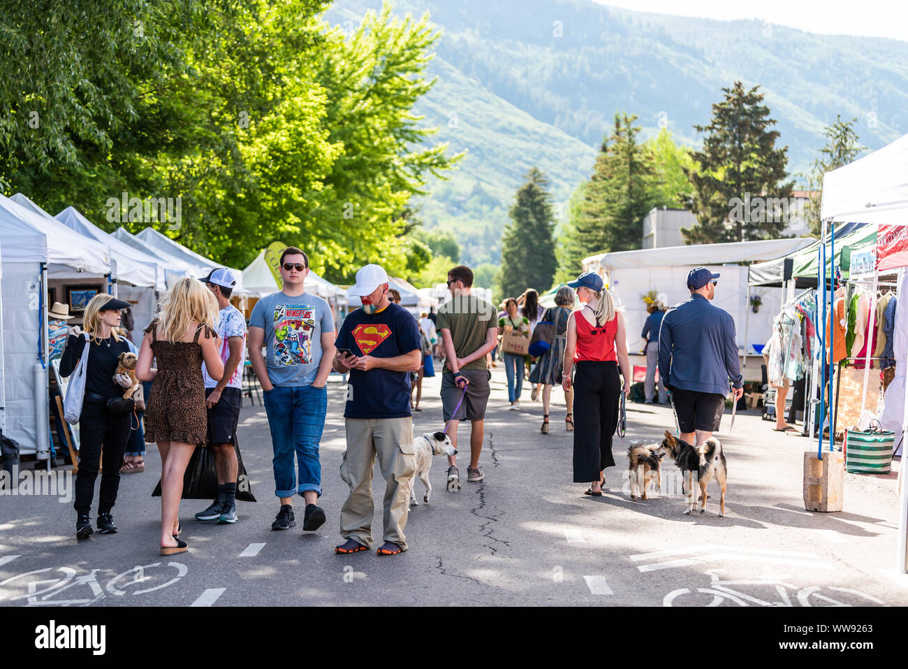 Aspen, USA - July 6, 2019: People walking by vendors selling products ...